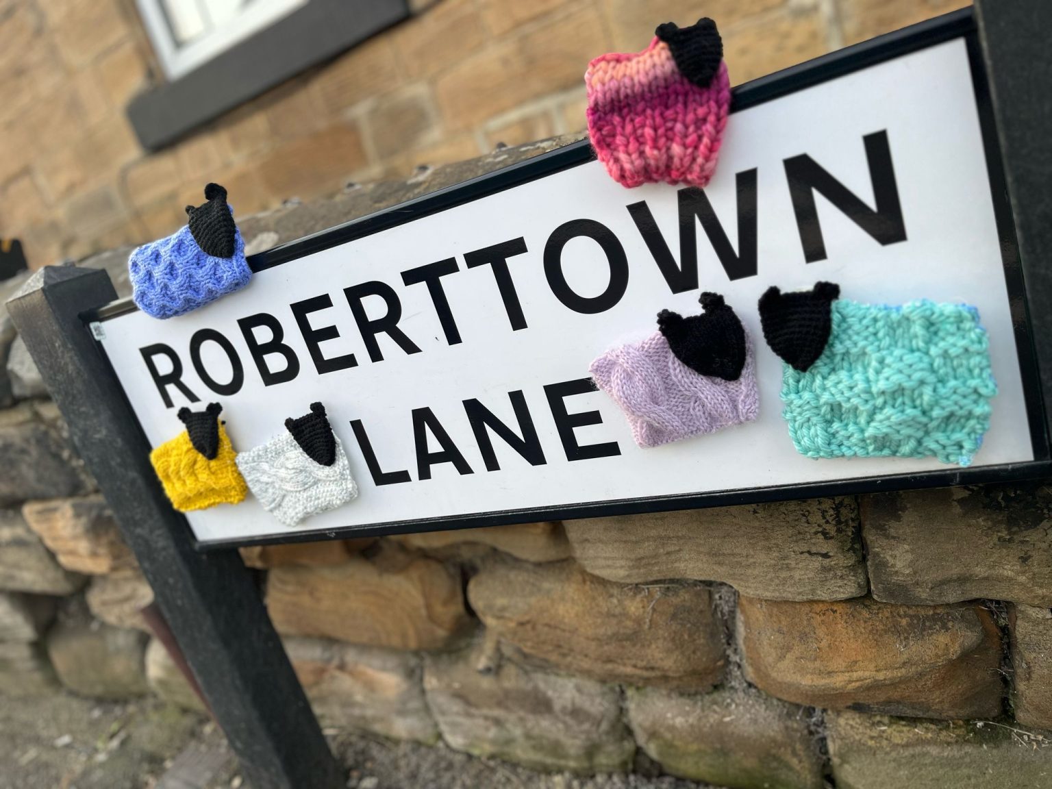 Yarn Bombing at Roberttown Village – WOVEN